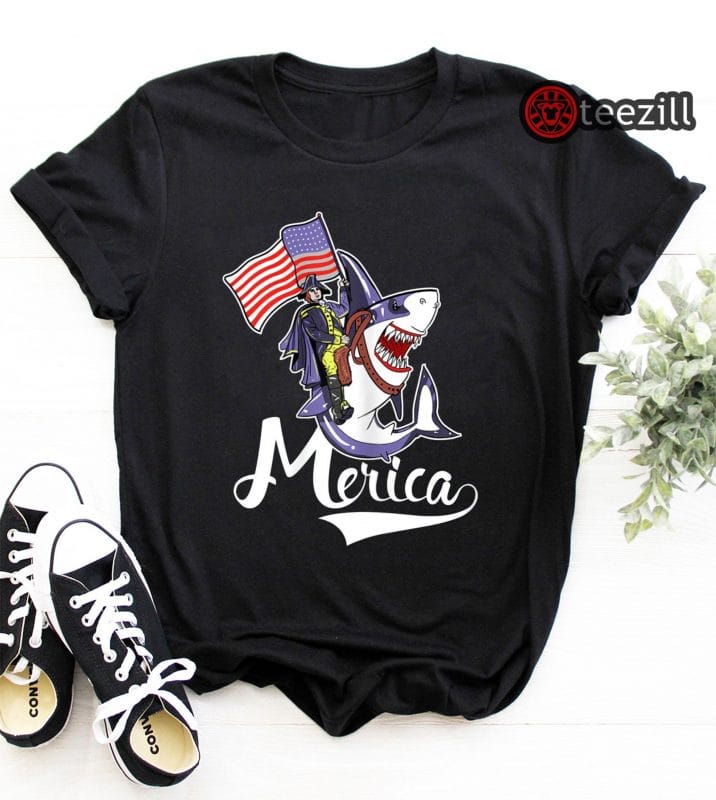 MERICA George Washington Riding a shark T-Shirts